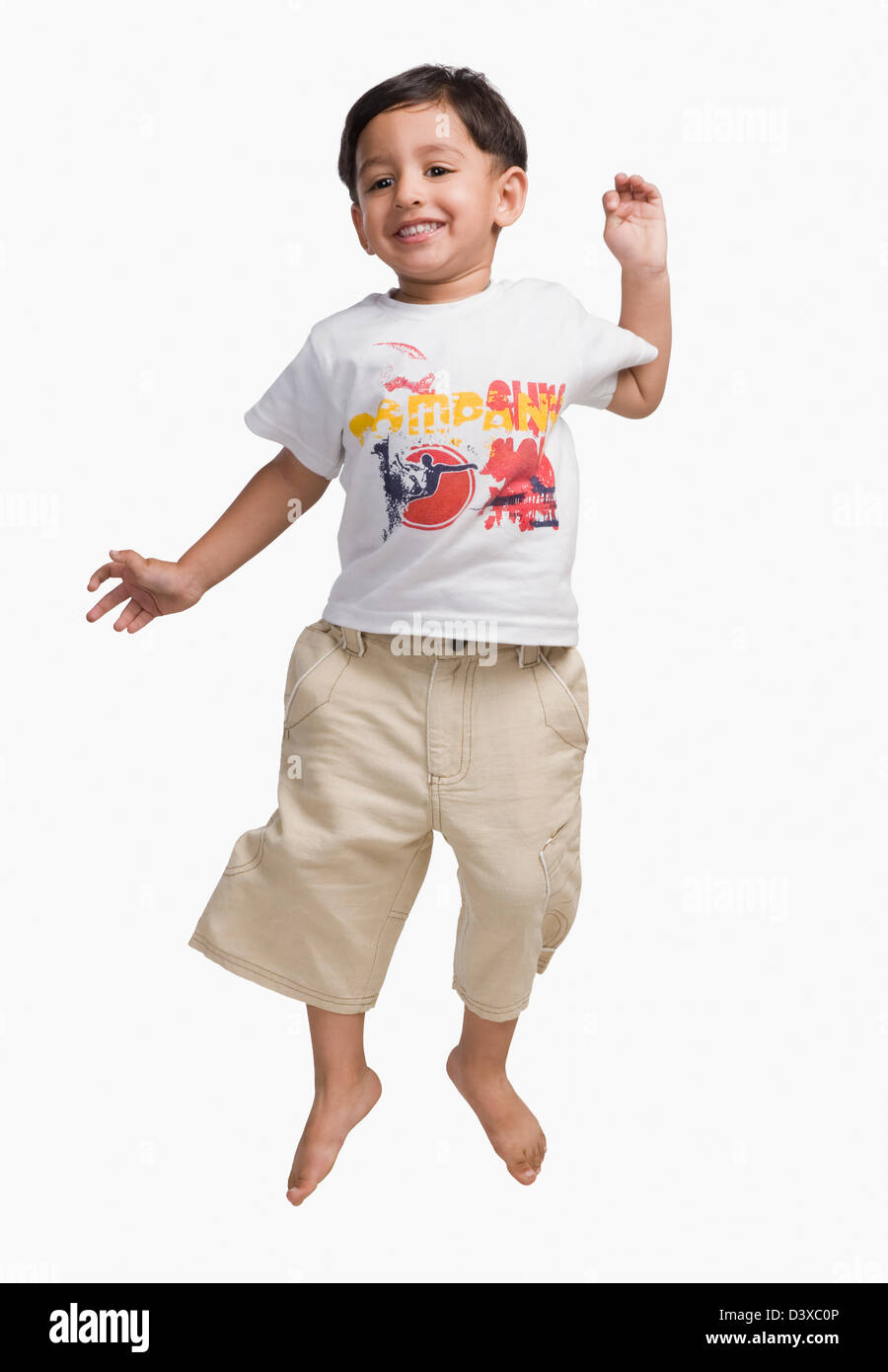 Baby boy jumping and smiling Stock Photo - Alamy