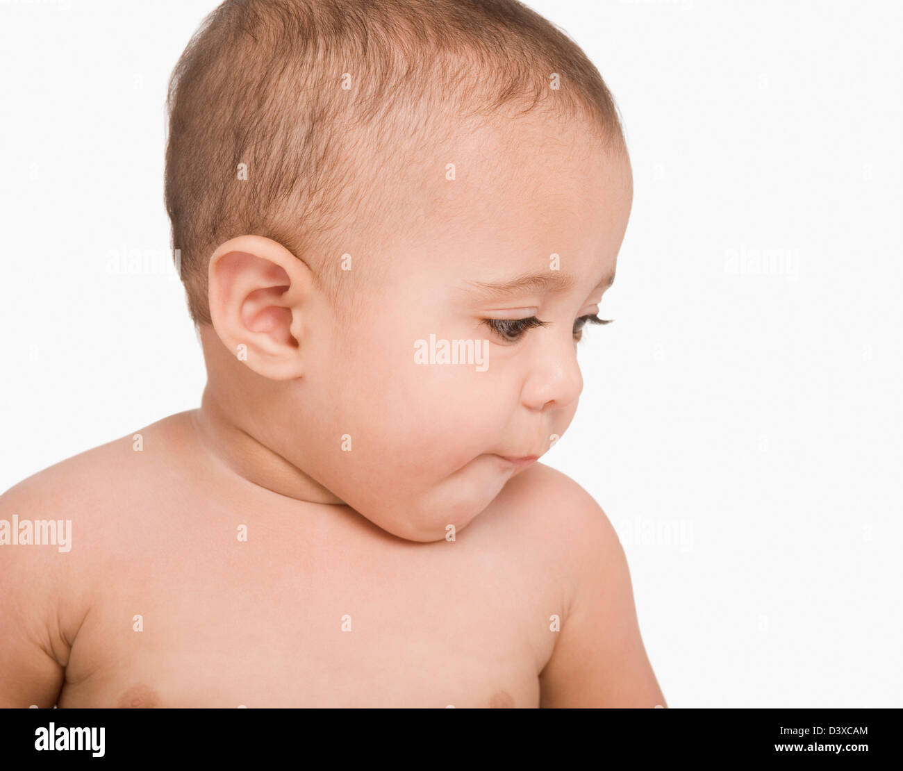 Close-up of a baby boy thinking Stock Photo - Alamy