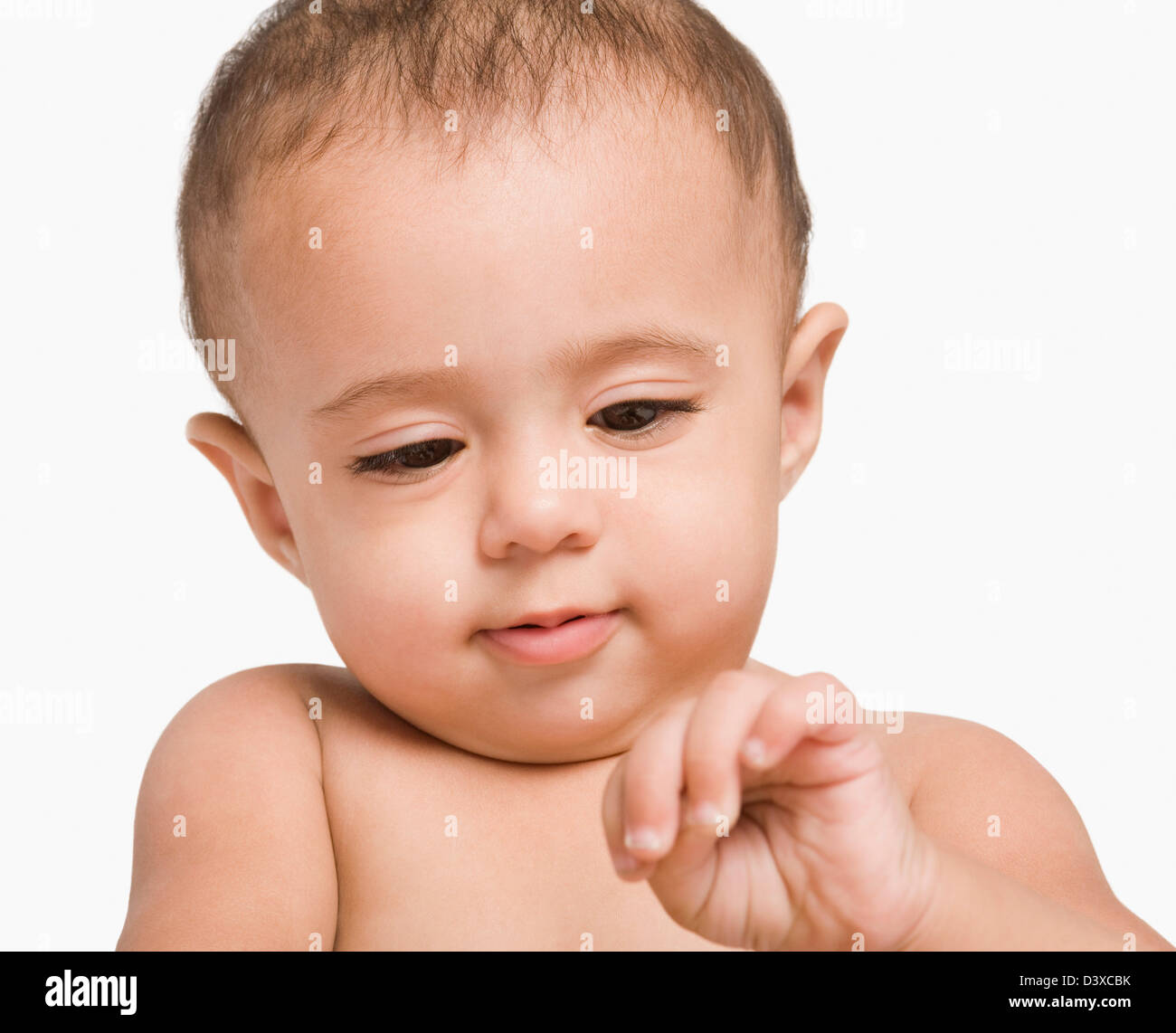 Close-up of a baby boy thinking Stock Photo - Alamy