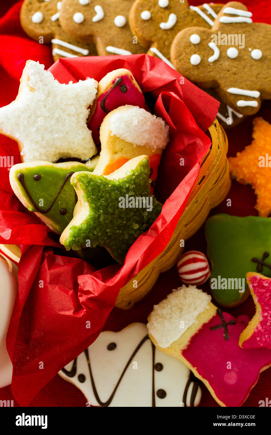 Assorted christmas cookies on red background Stock Photo - Alamy
