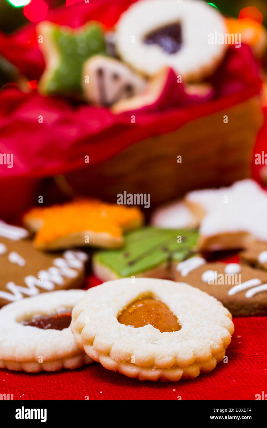 Assorted christmas cookies on red background Stock Photo - Alamy