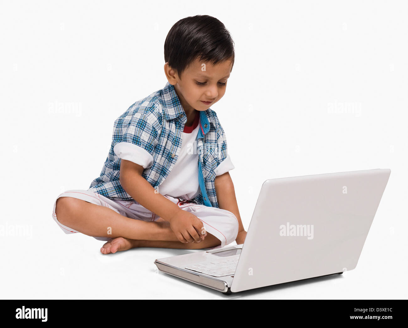 Child using laptop Cut Out Stock Images & Pictures - Alamy