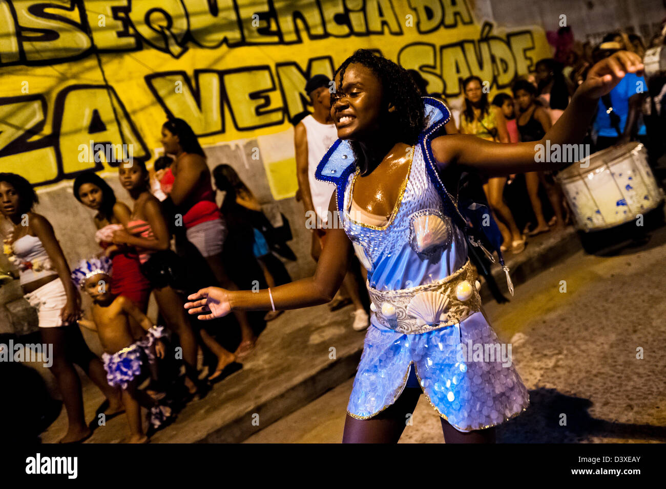 A Brazilian dancer performs during the Carnival parade in the favela of ...