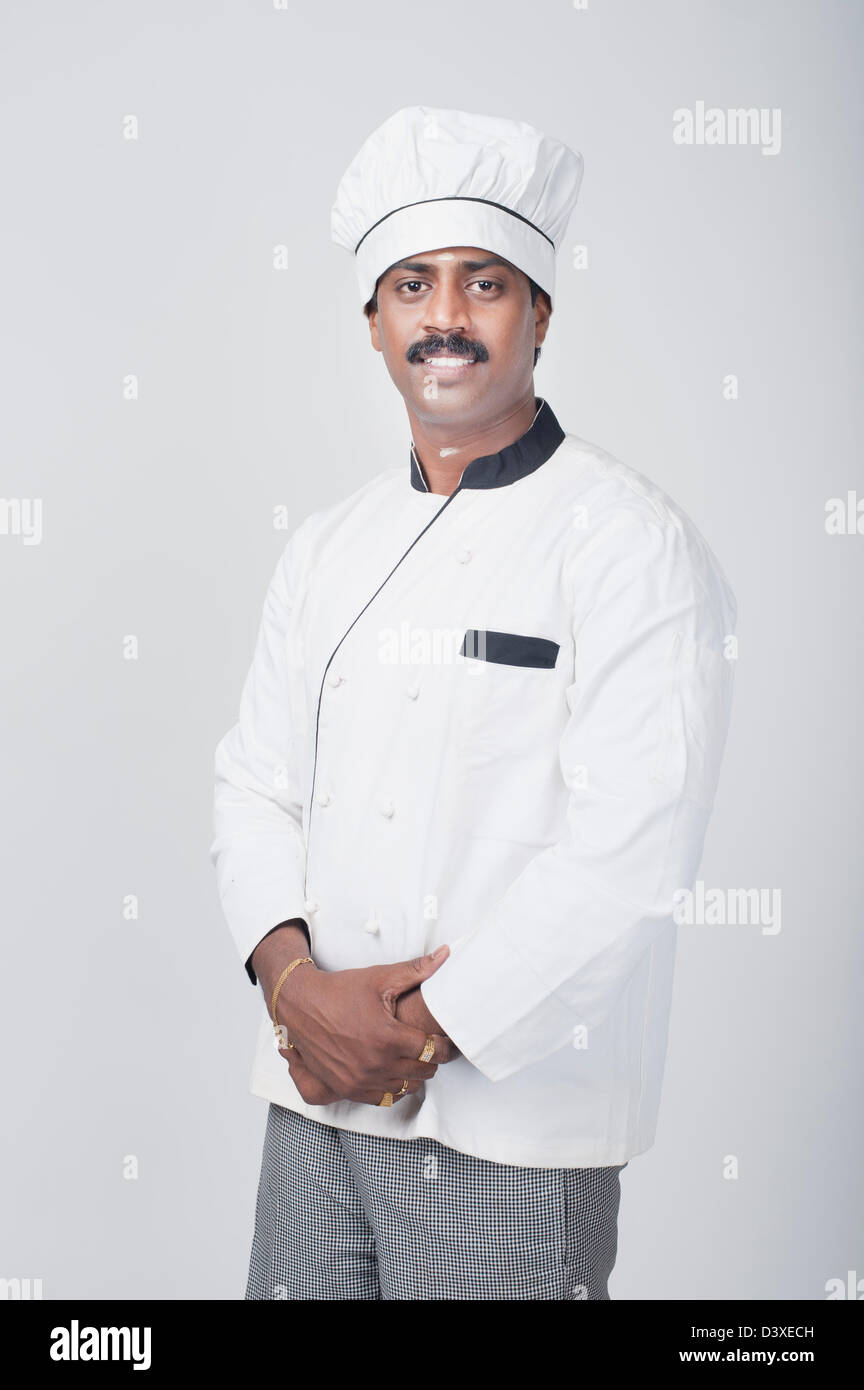 South Indian chef standing with his hands clasped and smiling Stock ...