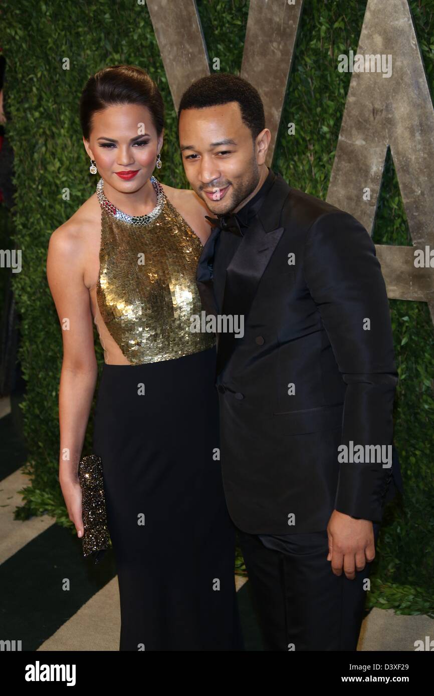 Singer John Legend and model Christine Teigen arrive at the Vanity Fair ...