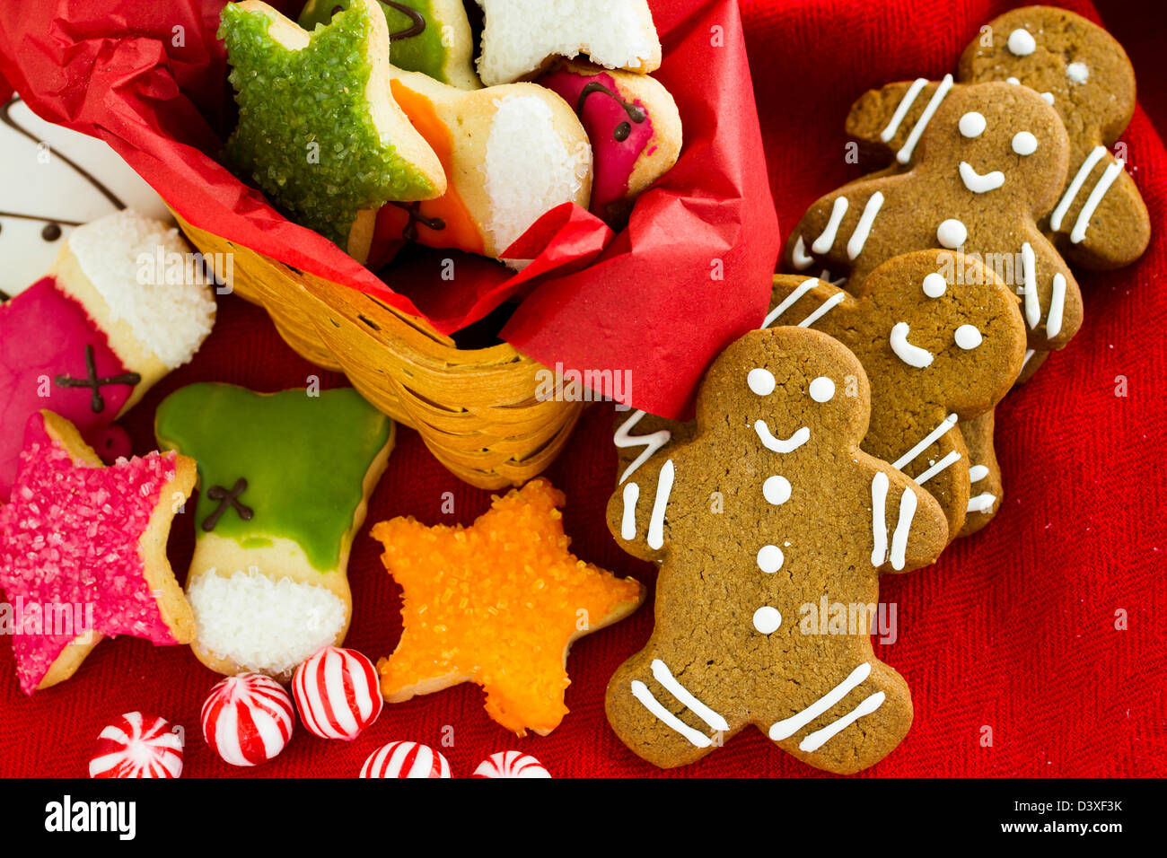 Assorted christmas cookies on red background Stock Photo - Alamy