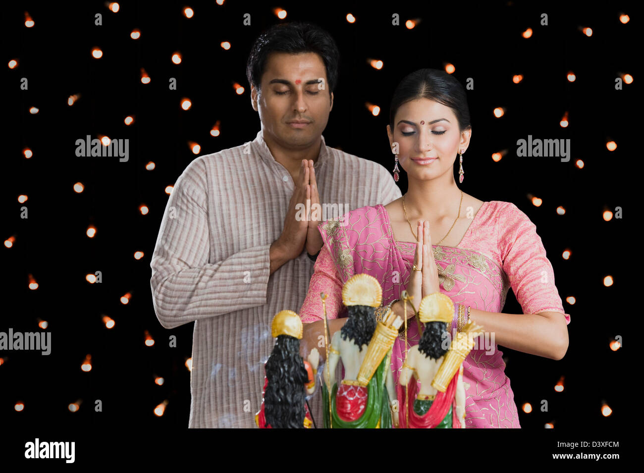 Women praying statue hindu hi-res stock photography and images - Alamy