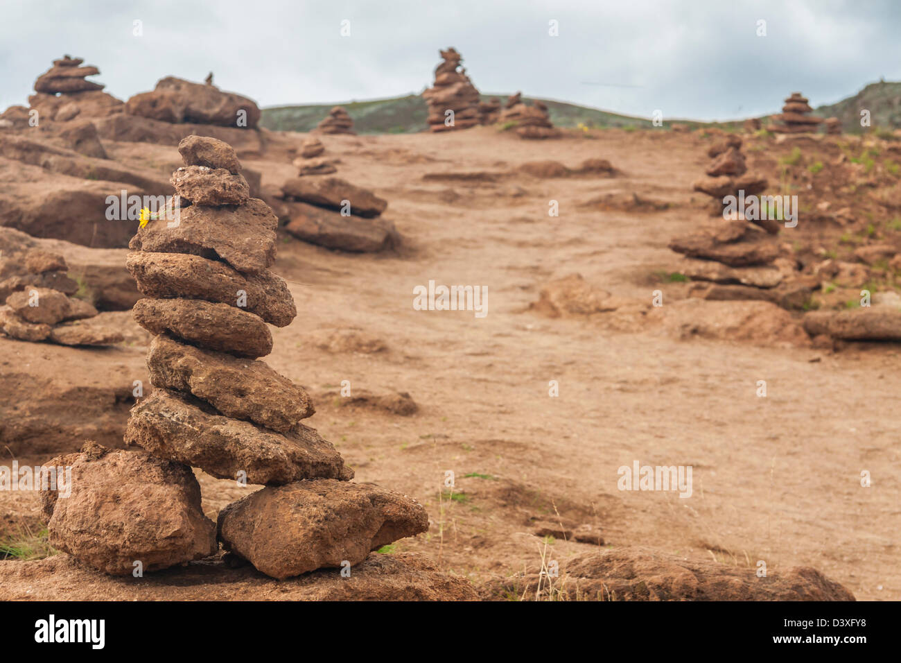 Stony tower pointer to the path - Iceland, Geyser area Stock Photo - Alamy