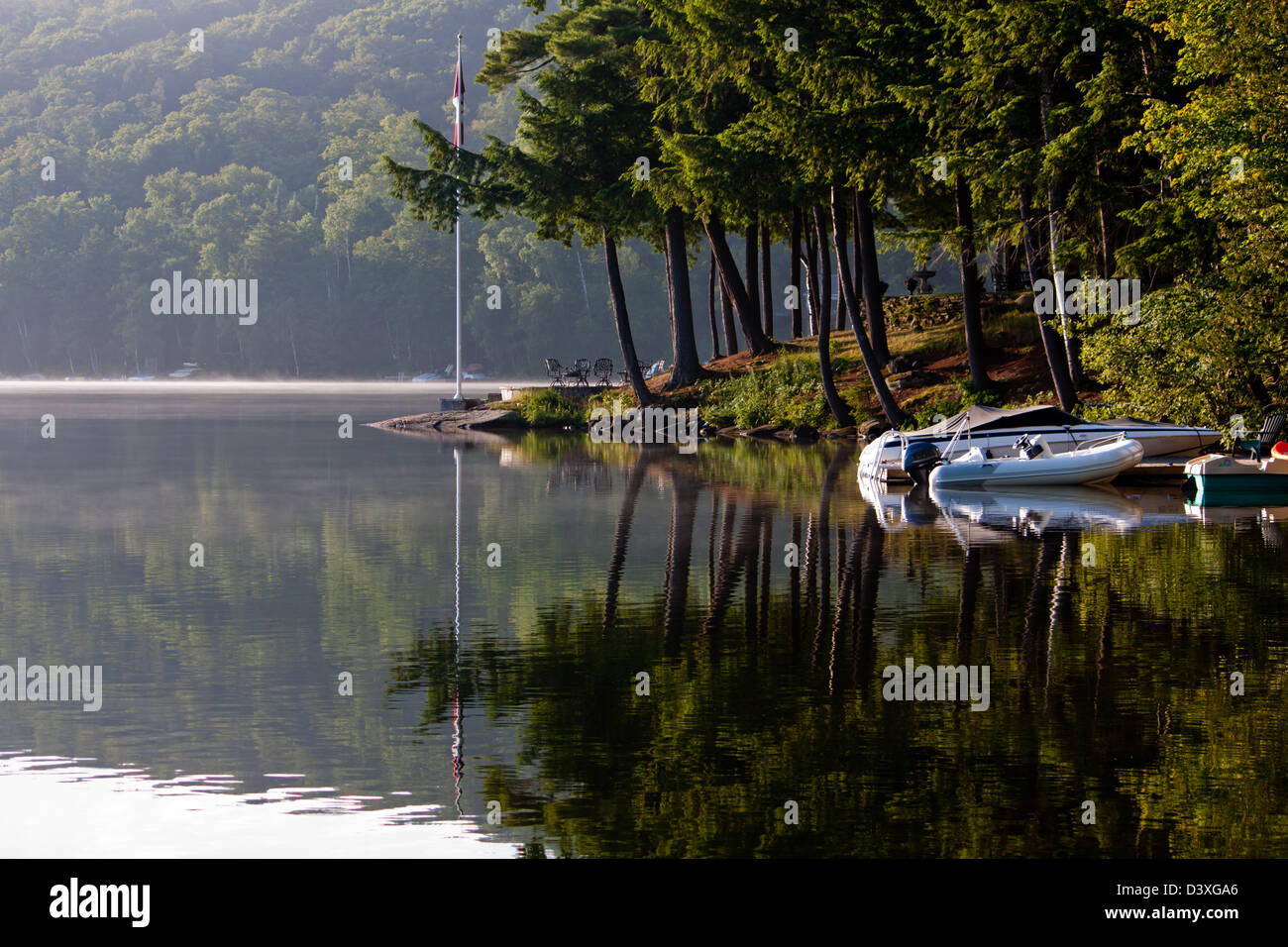 Summer sunrise over lake with dock hi-res stock photography and images ...