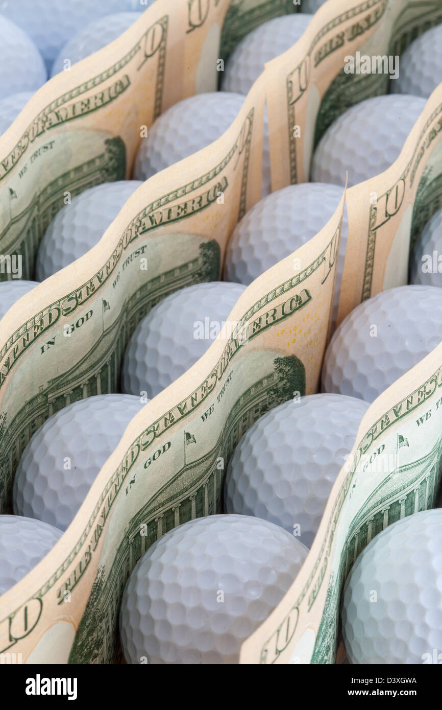 White golf balls and dollars banknotes Stock Photo - Alamy