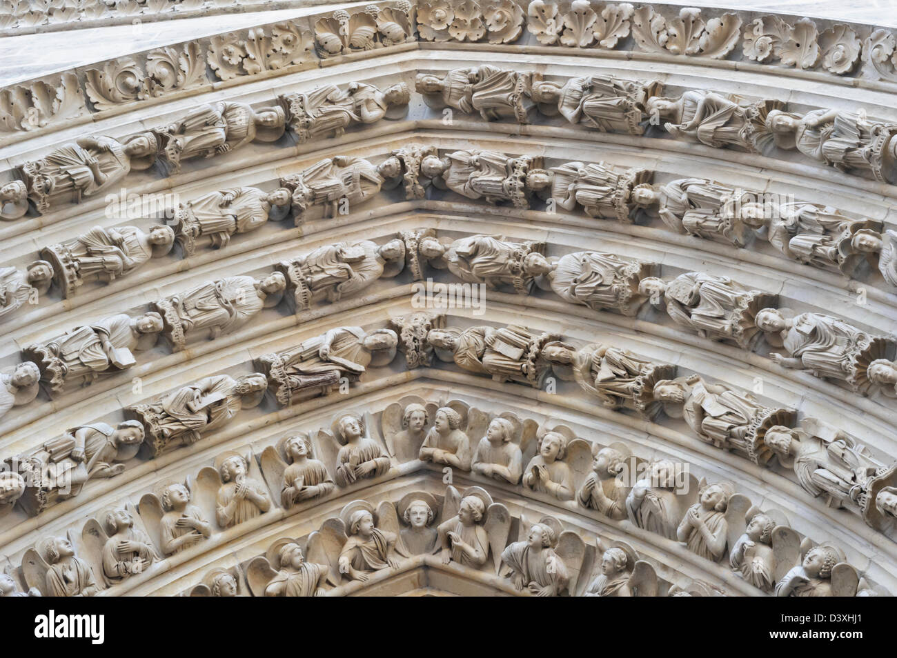 Bas relief figures at the entrance of Notre Dame Cathedral, Paris ...