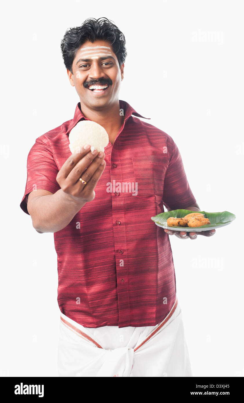 Indian man eating Cut Out Stock Images & Pictures - Alamy