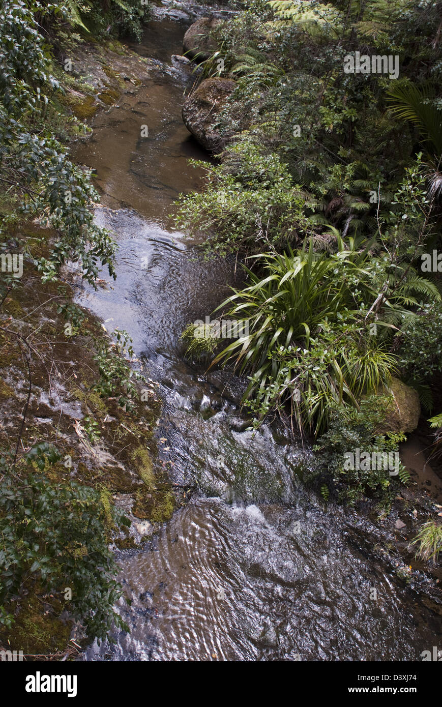 Stream flowing into rocks hi-res stock photography and images - Alamy