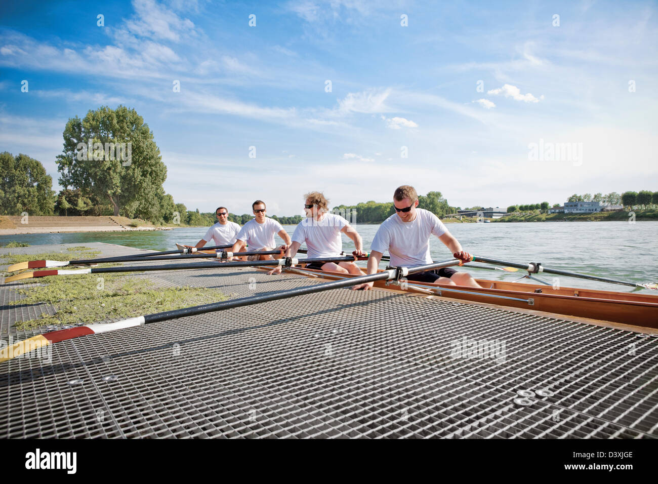 Teamwork Concept of Men Rowing Team Mounting Boat in Coordination Stock ...