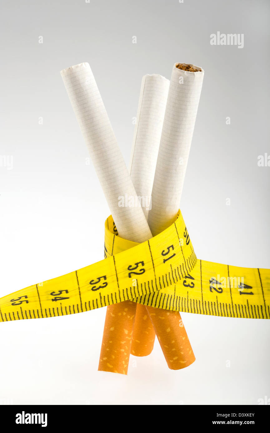 Tape measure and cigarets hi-res stock photography and images - Alamy Tape measure and cigarets hi-res stock photography and images - Alamy