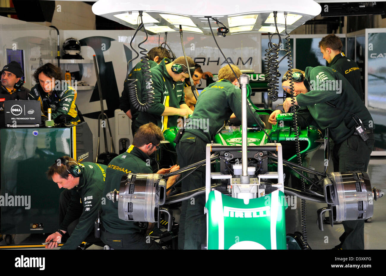 Caterham mechanics work on race car during Formula One tests Stock ...