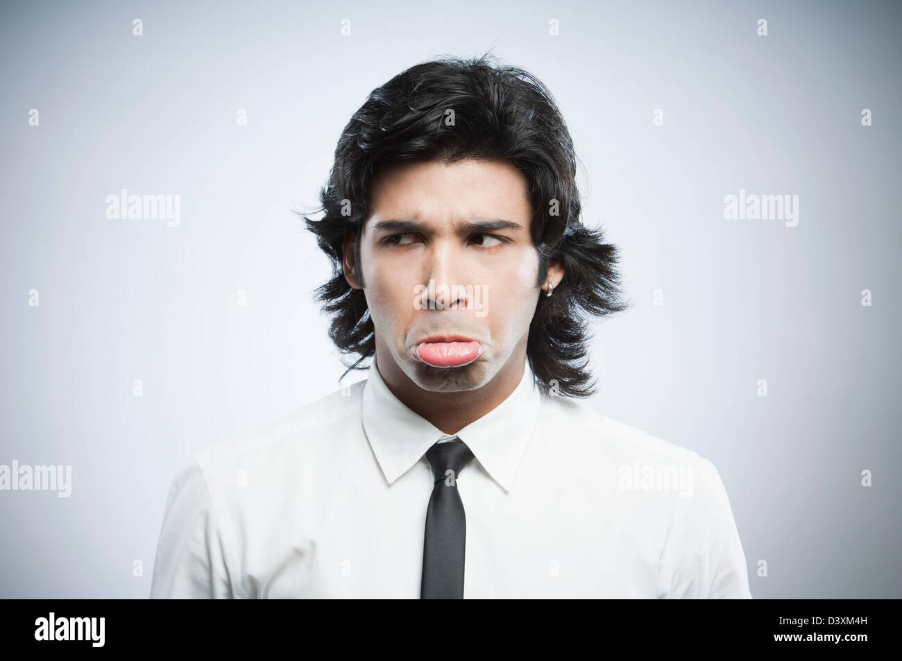 Indian grumpy man serious sulking hi-res stock photography and images ...