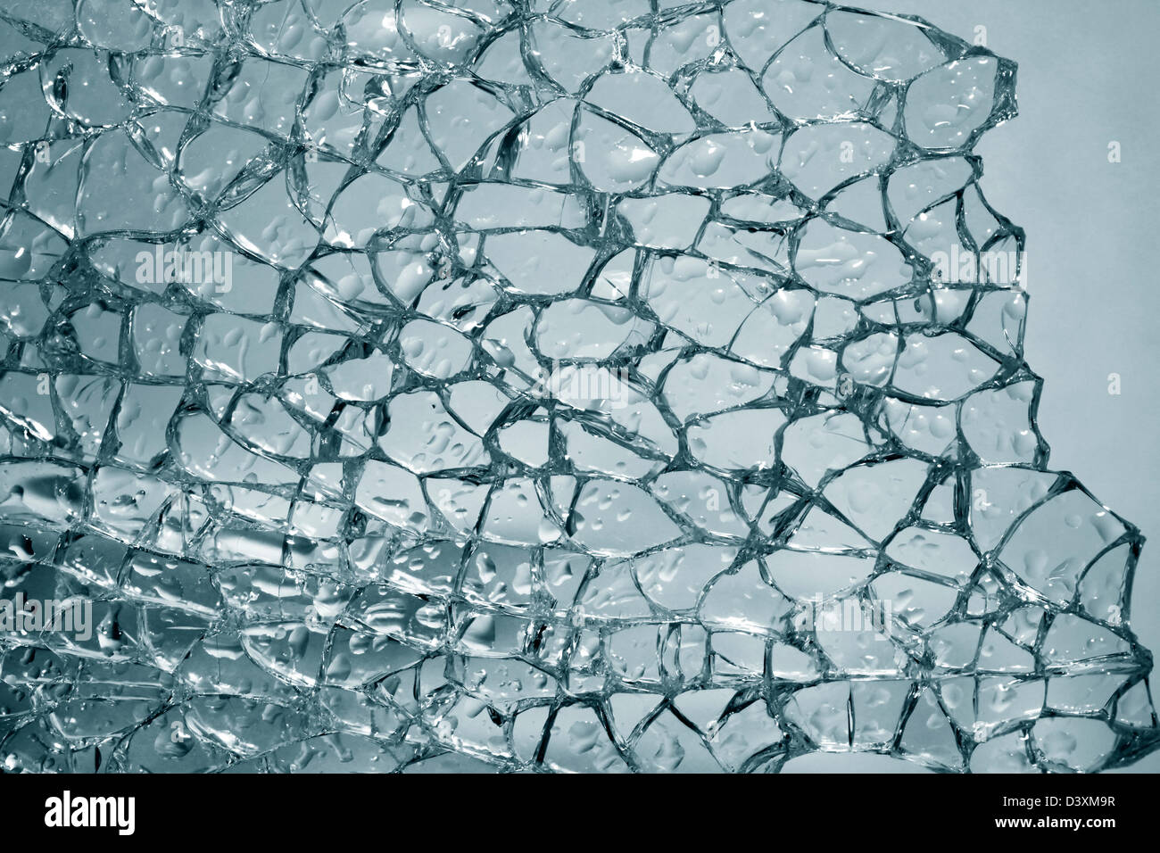 The broken glass with drops is strongly dim Stock Photo - Alamy