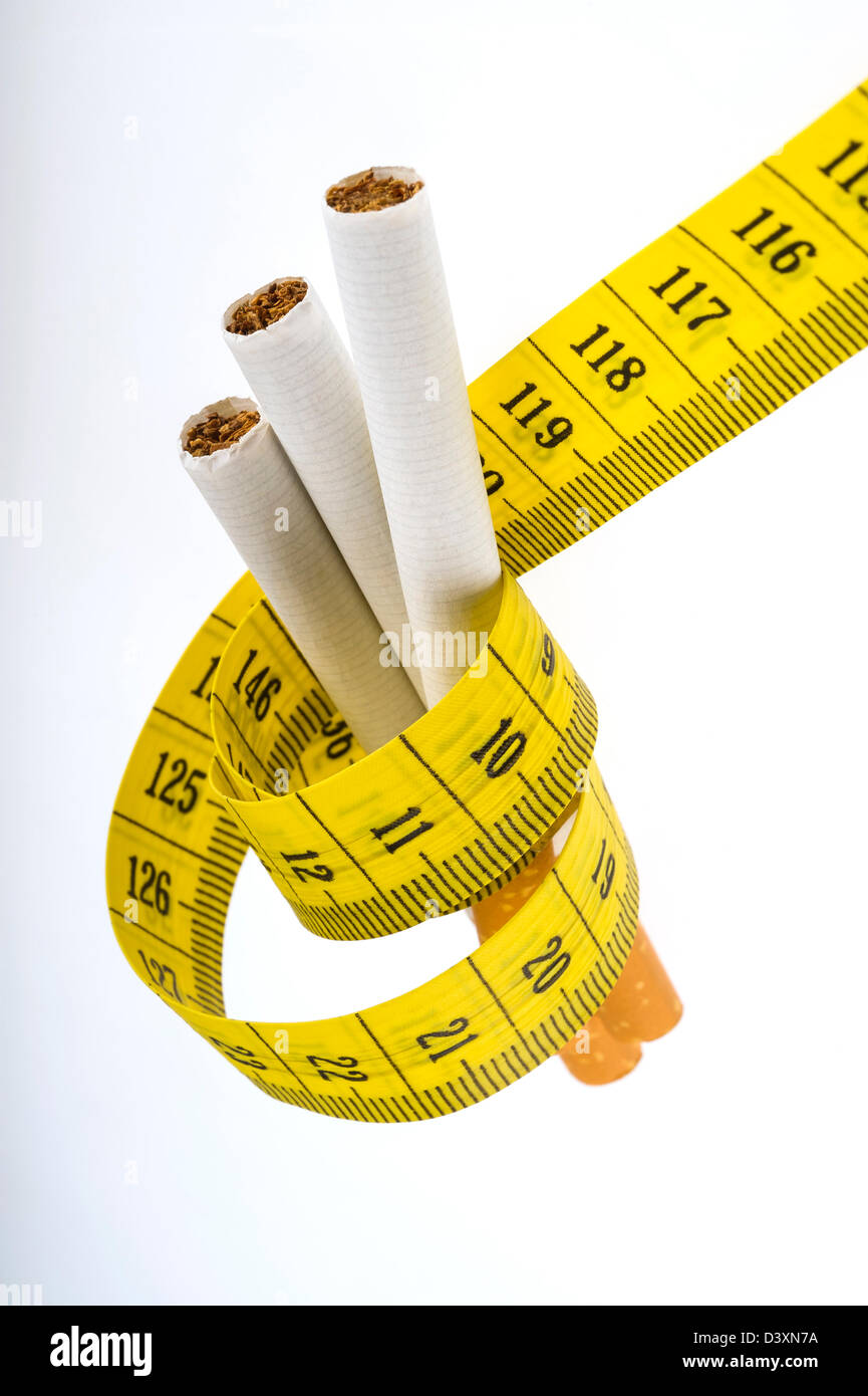 tape measure and cigarette Stock Photo - Alamy