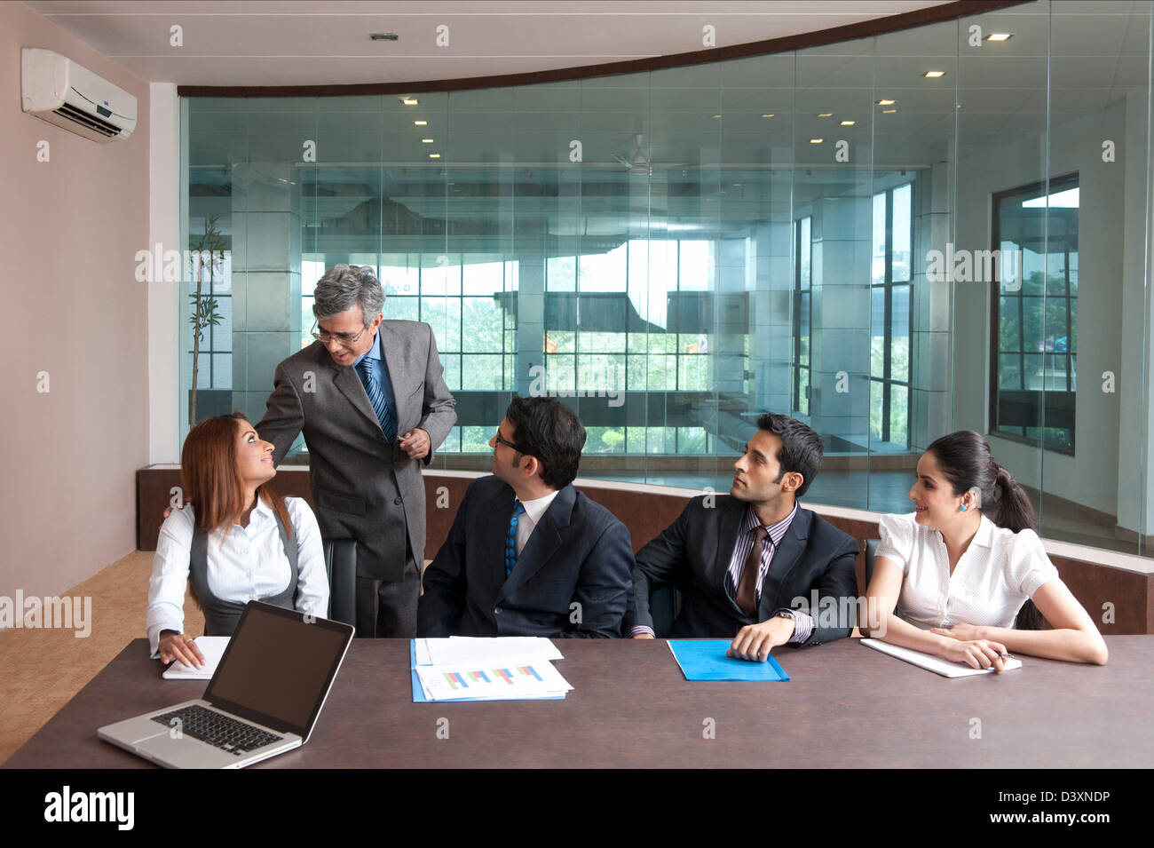 Business executives discussing in a meeting Stock Photo - Alamy