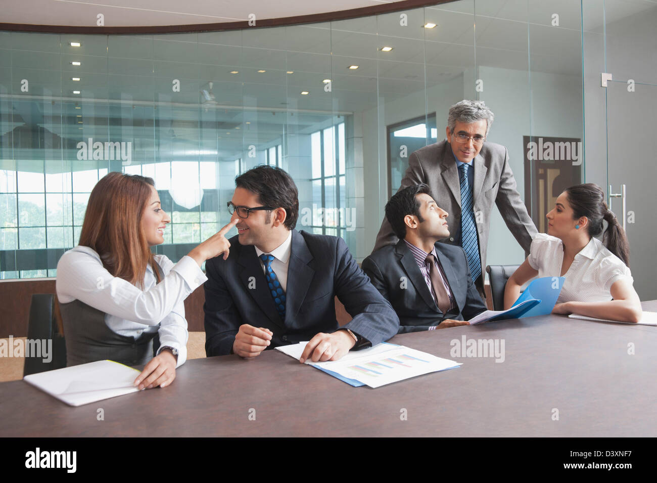 Business executives discussing in a meeting Stock Photo - Alamy