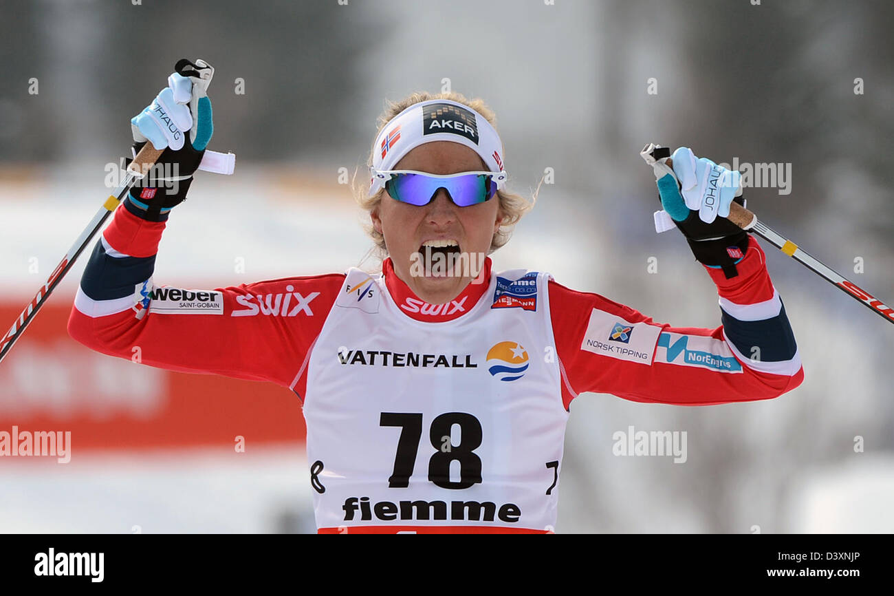 Norway's Therese Johaug celebrates in the finish area after winning the ...