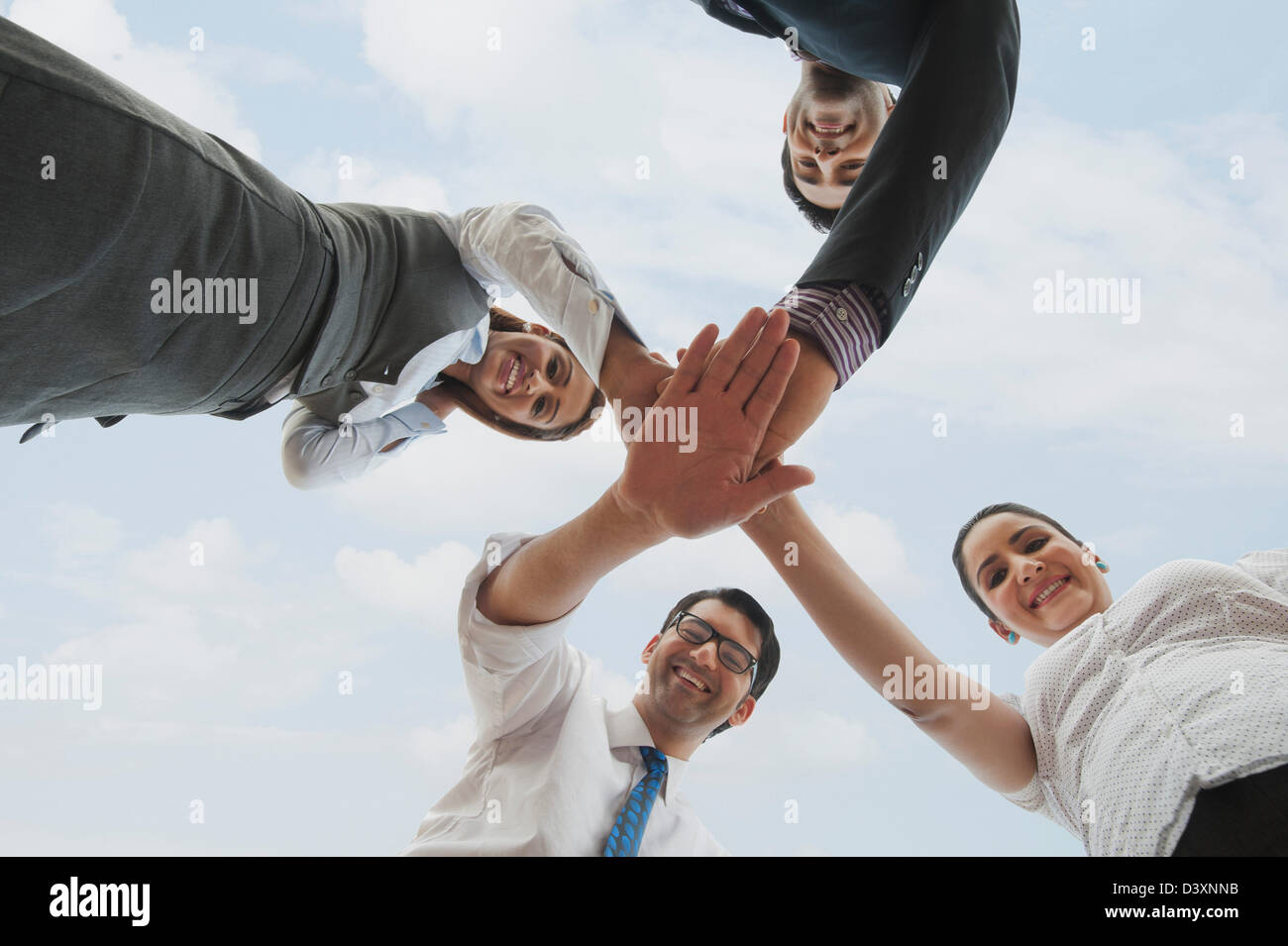 Women clasping hands High Resolution Stock Photography and Images - Alamy