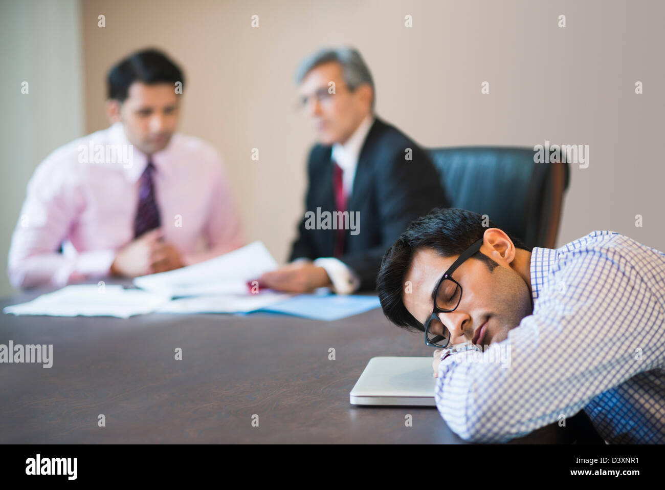Indian businessman sleeping in office hi-res stock photography and ...