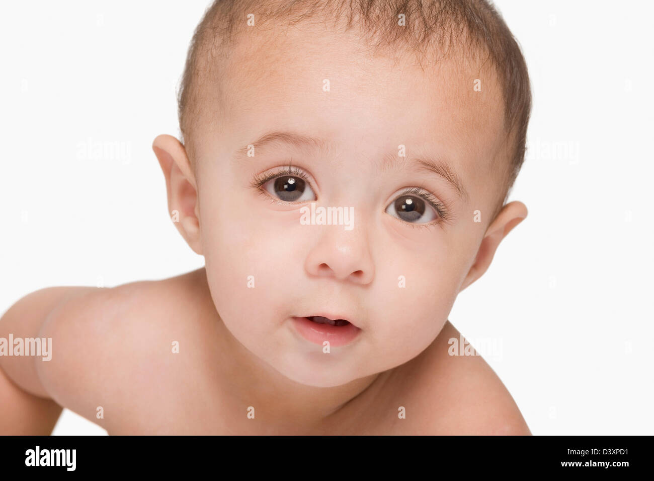 Close-up of a baby boy thinking Stock Photo - Alamy