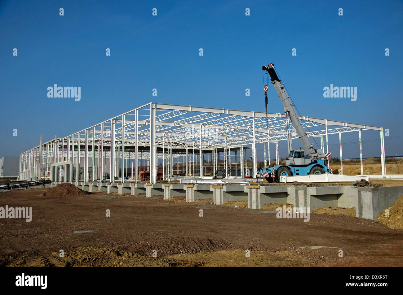 Photo of construction site of modern warehouse Stock Photo - Alamy