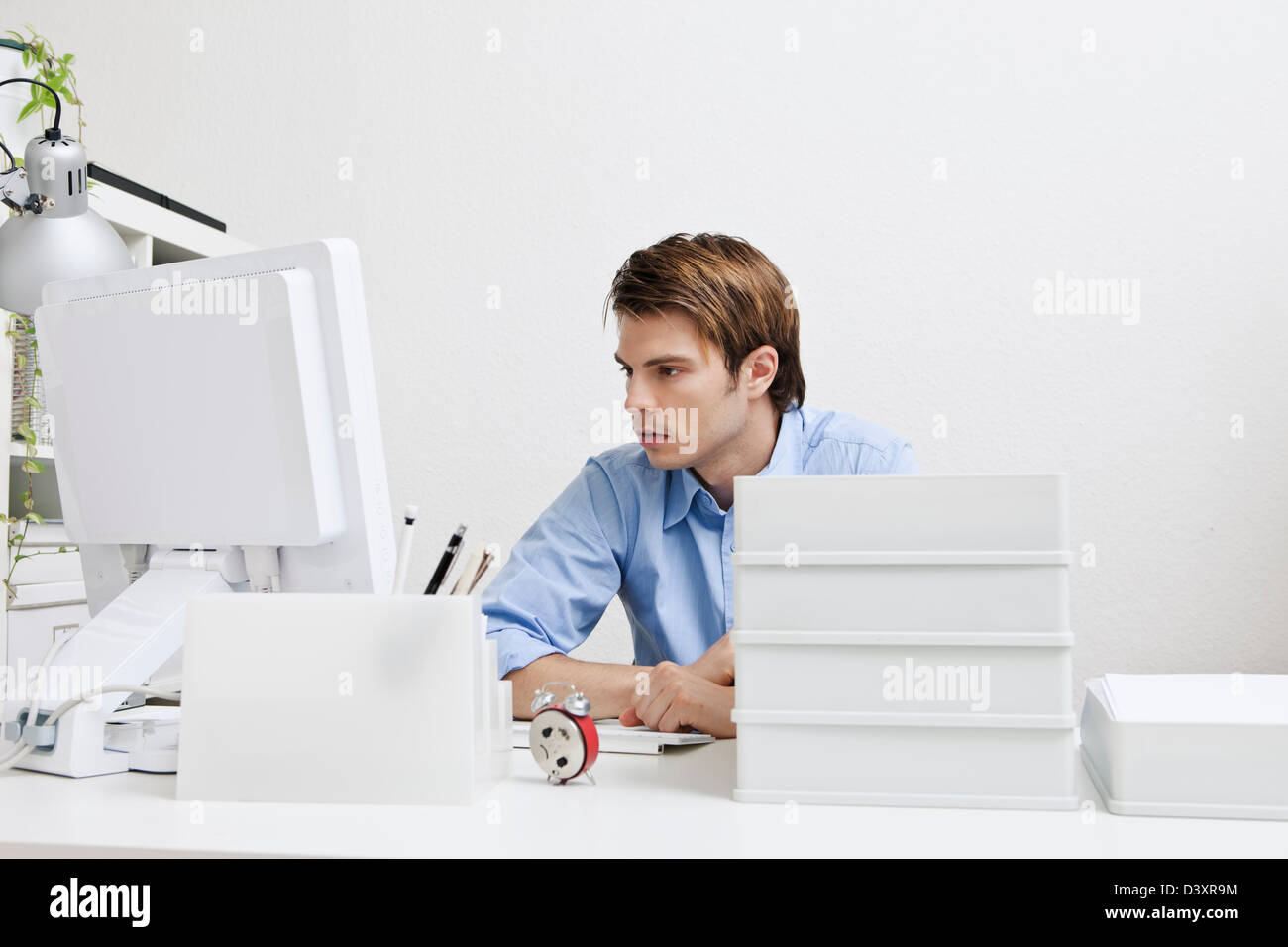Office personnel busy at work Stock Photo - Alamy