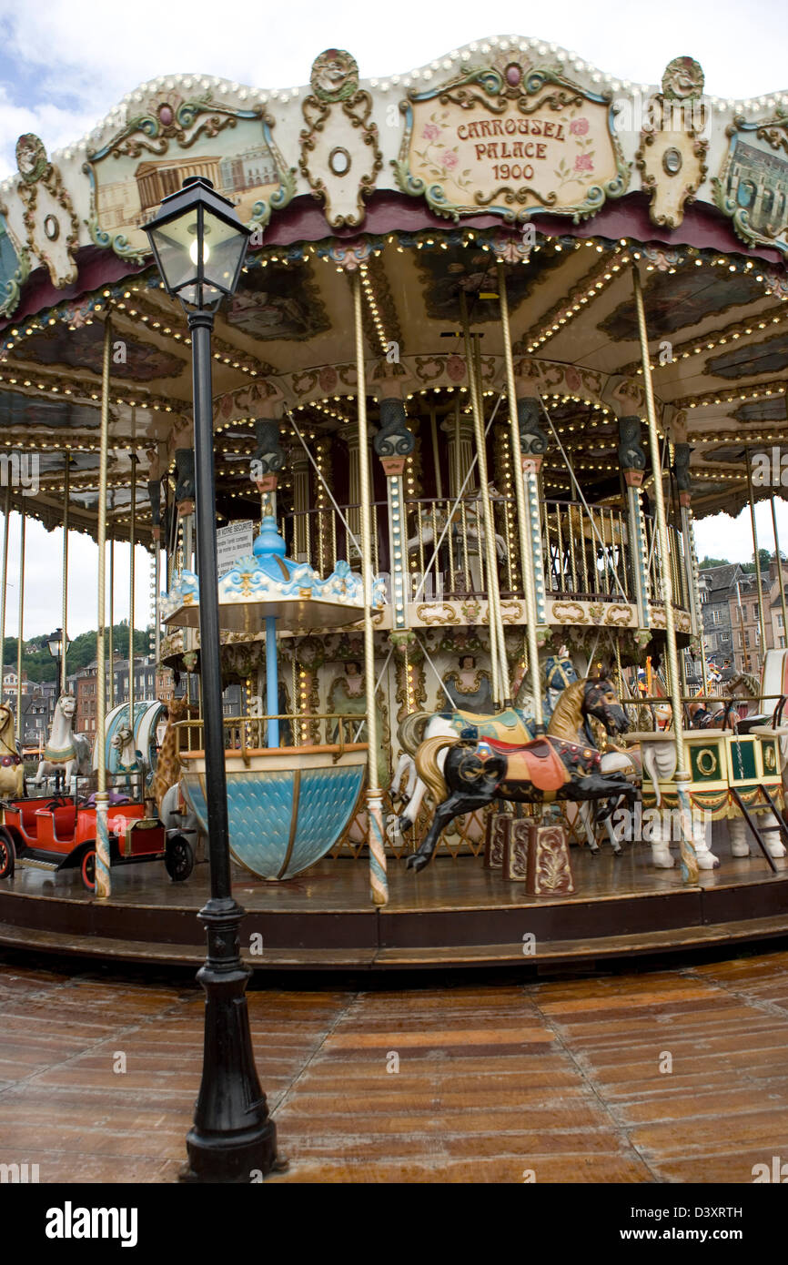 Carousel in the port of Honfleur, Normandy France Stock Photo - Alamy