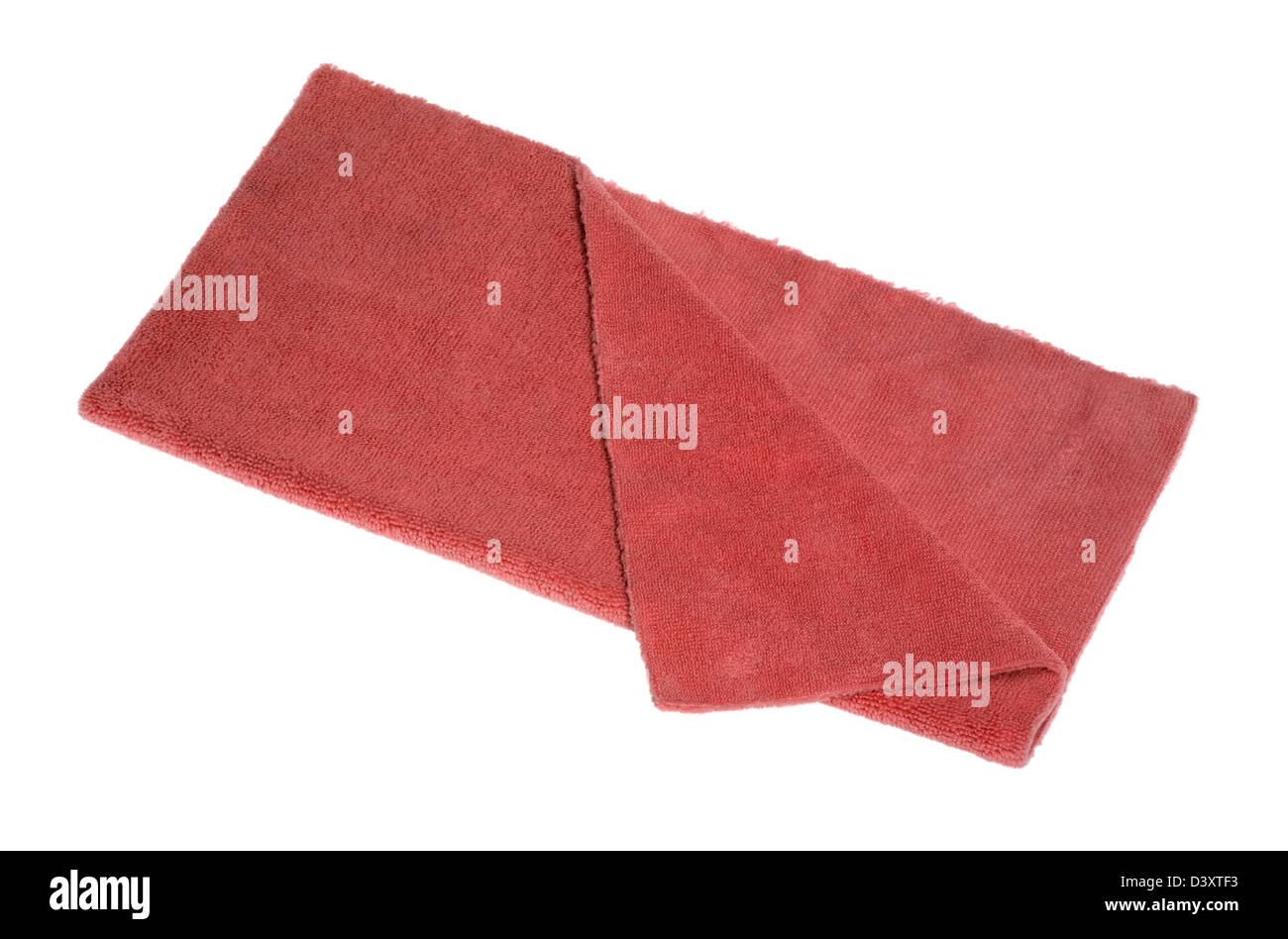 studio photography of a red folded microfiber duster isolated on white ...