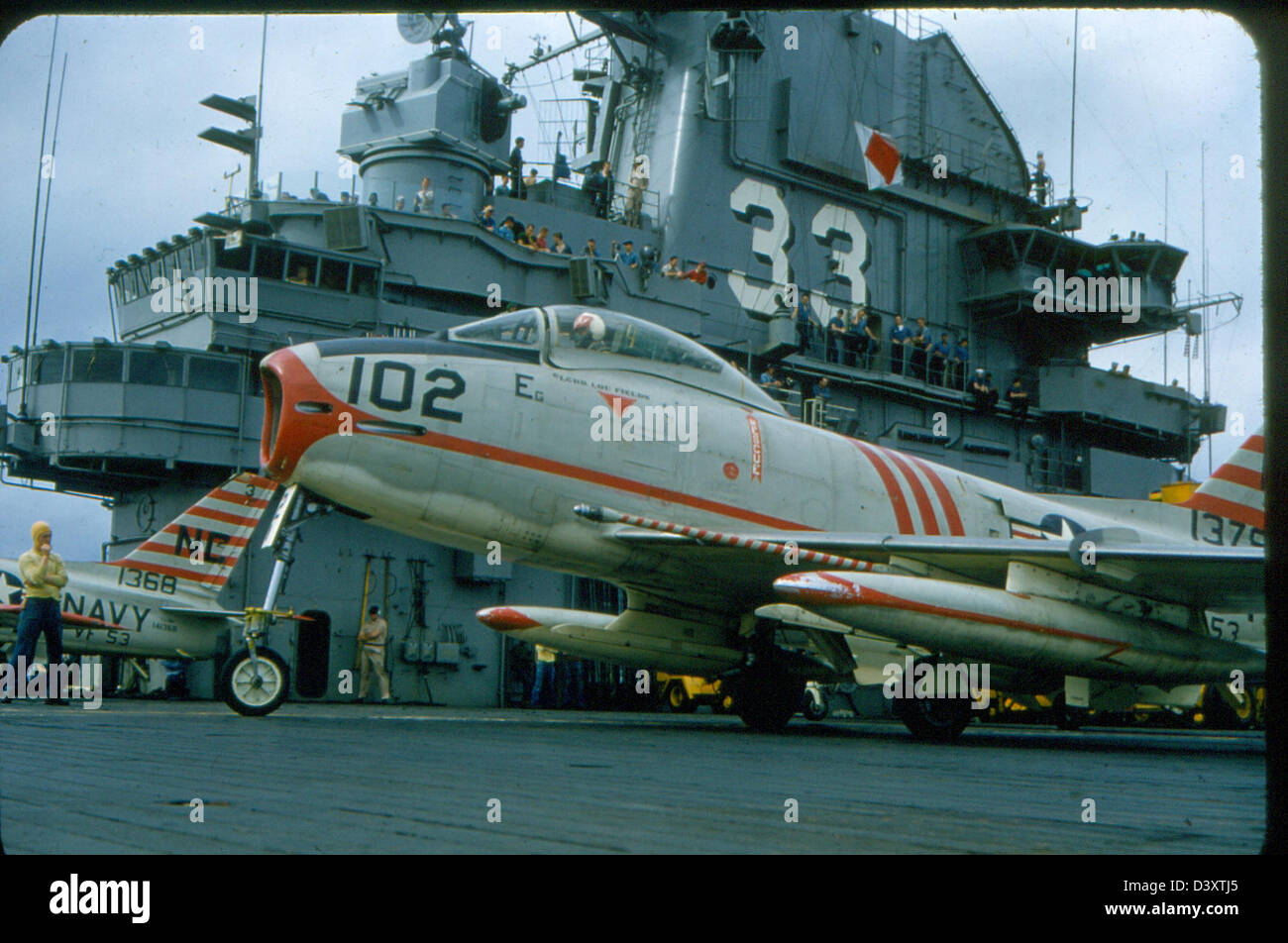 A photograph from the James Smith Special Collection depicting the USS Kearsarge (CV-33) and its ...