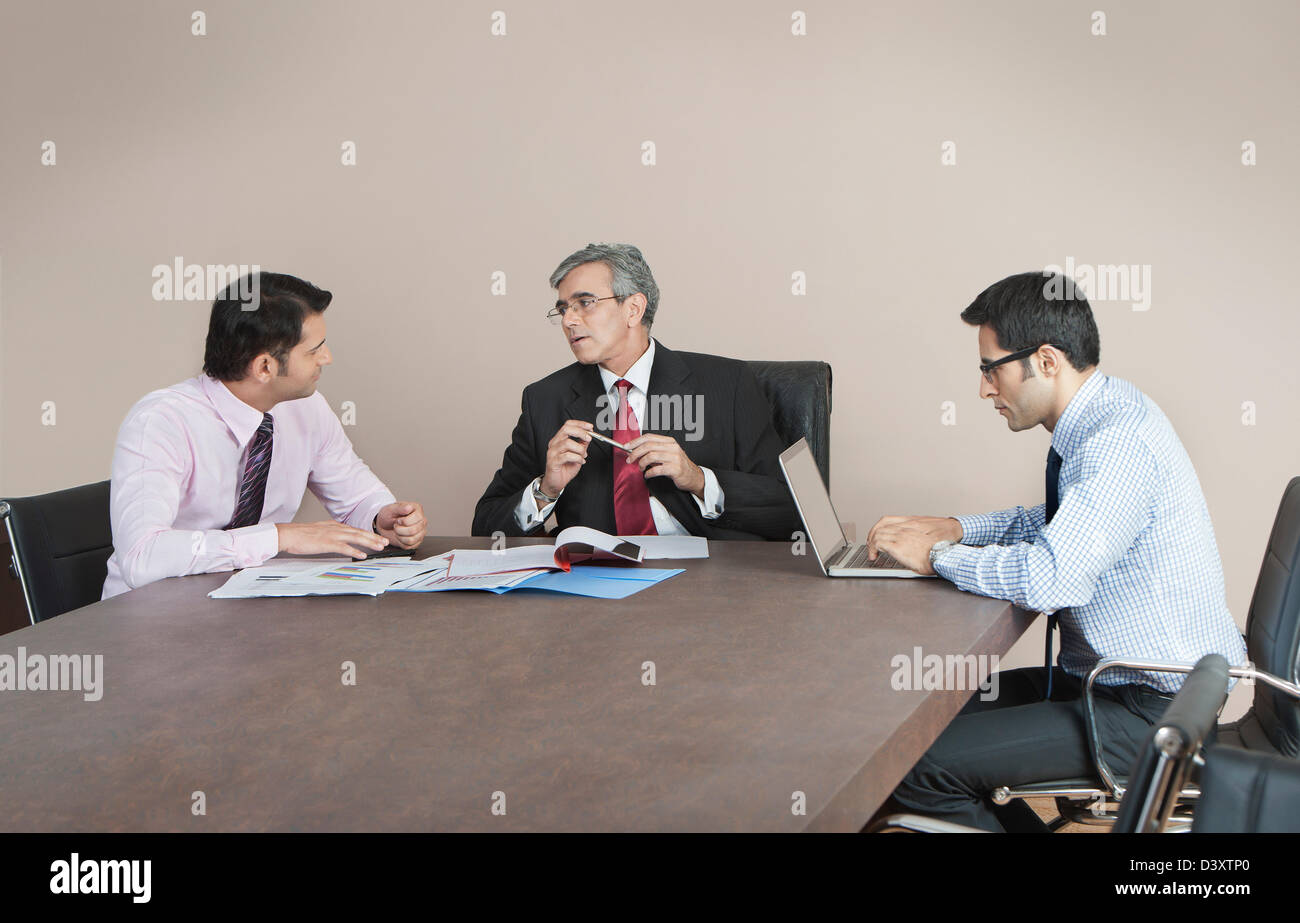 Business executives discussing in a meeting Stock Photo - Alamy
