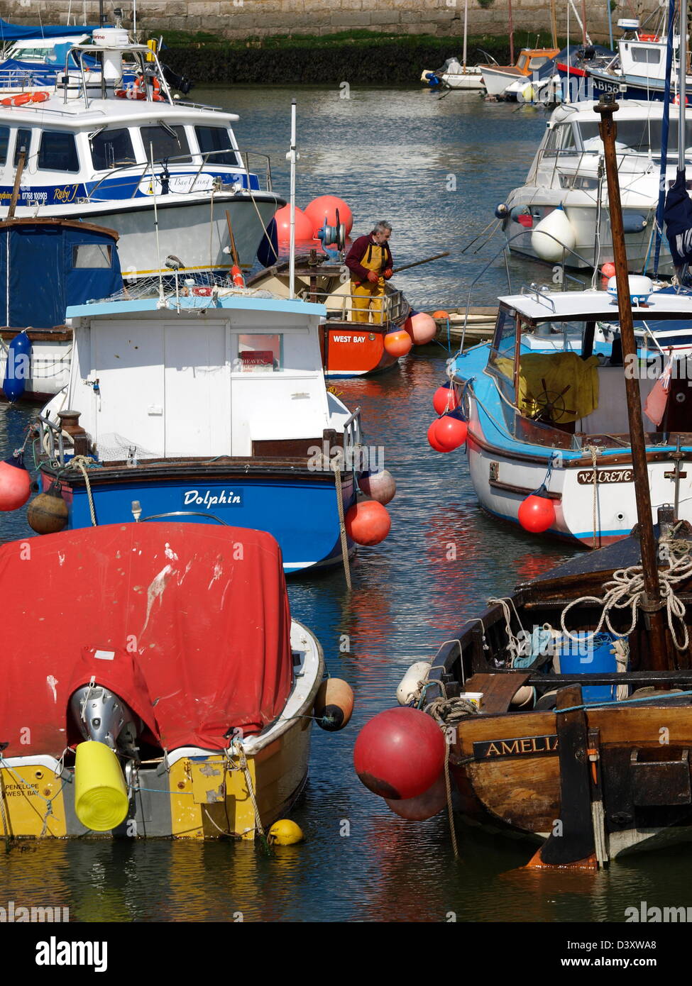 Colourful boats in harbour Stock Photo - Alamy
