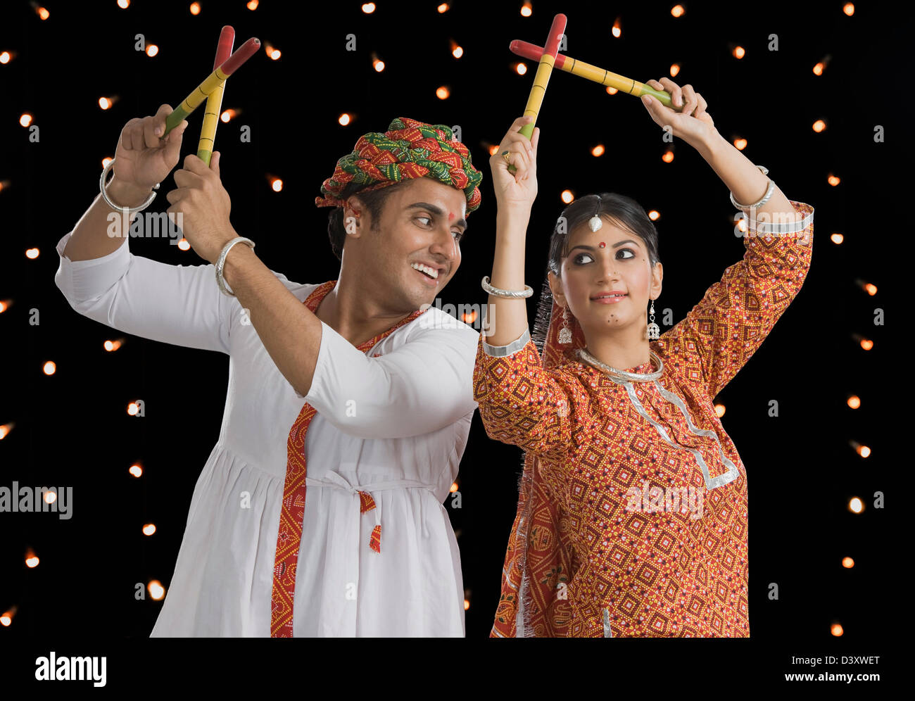 Women performing traditional dandiya dance hi-res stock photography and ...