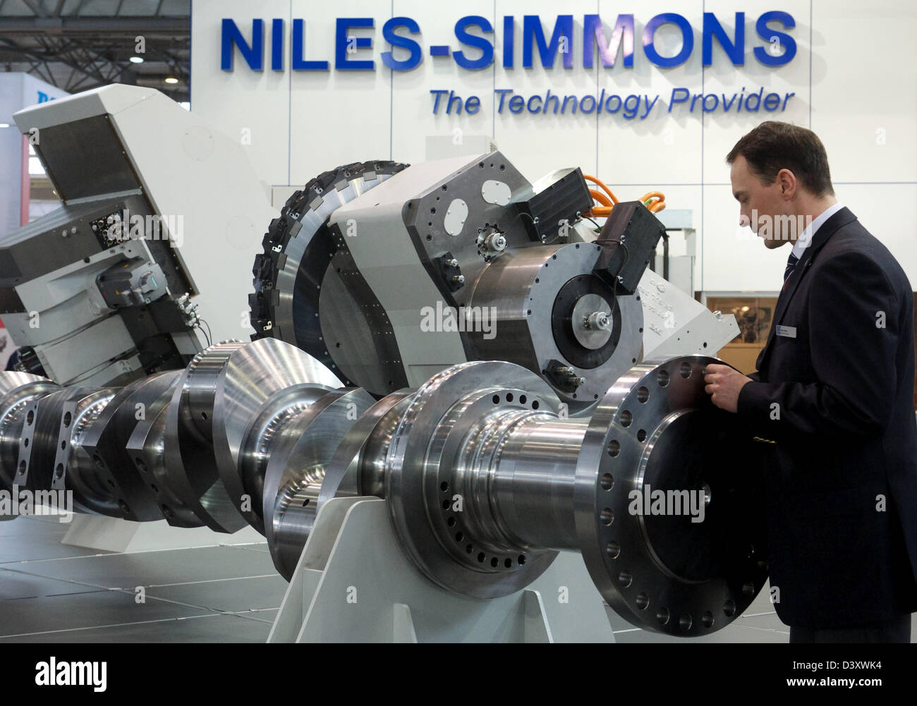 An employee of Niles-Simmons Industrieanlagen GmbH stands at an ...