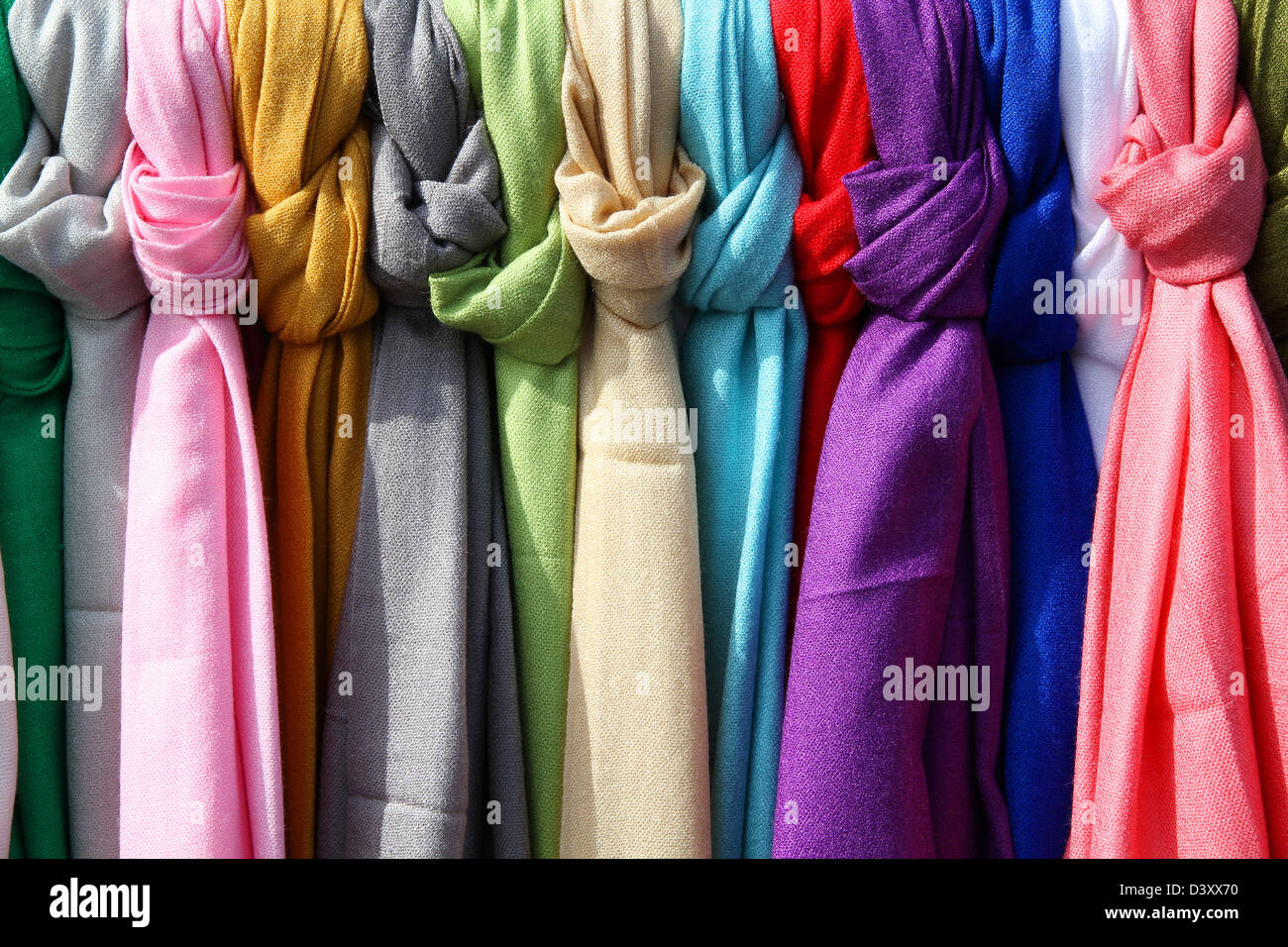 Colorful scarves at a market in Italy. Colors of textiles Stock Photo ...
