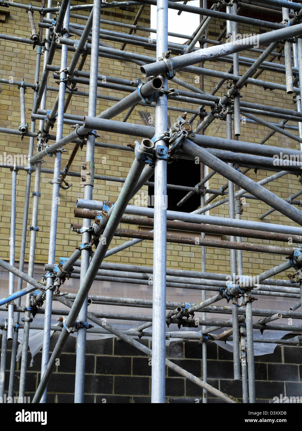 Strong structure of scaffolding next to building Stock Photo - Alamy Strong structure of scaffolding next to building Stock Photo - Alamy