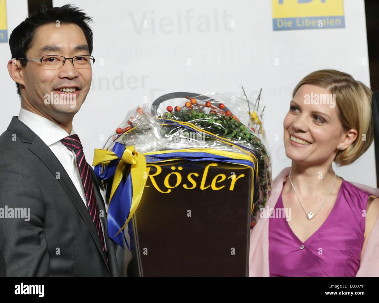 German Federal Economics Minister Philipp Roesler receives a present ...
