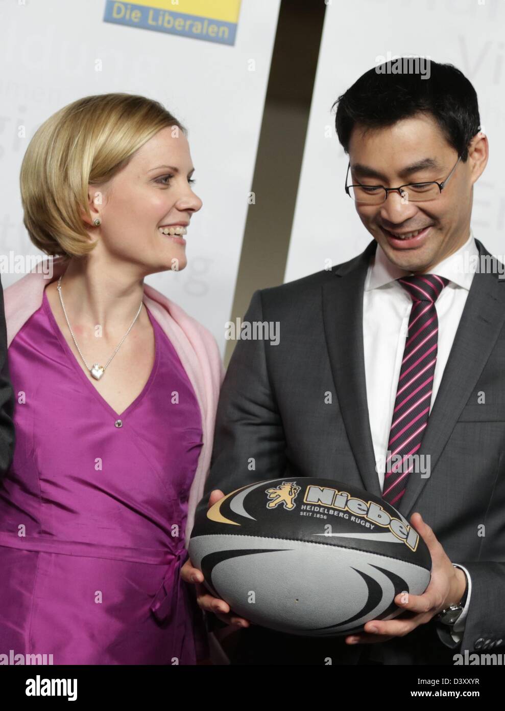 German Federal Economics Minister Philipp Roesler receives a present ...