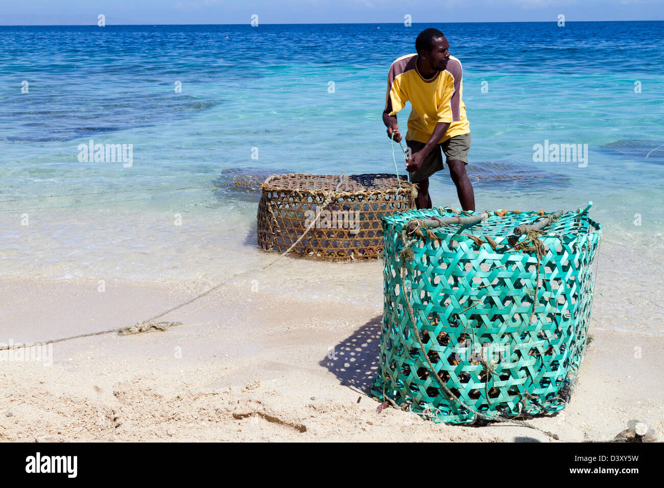 fishermen selling lobsters on a beach Stock Photo - Alamy