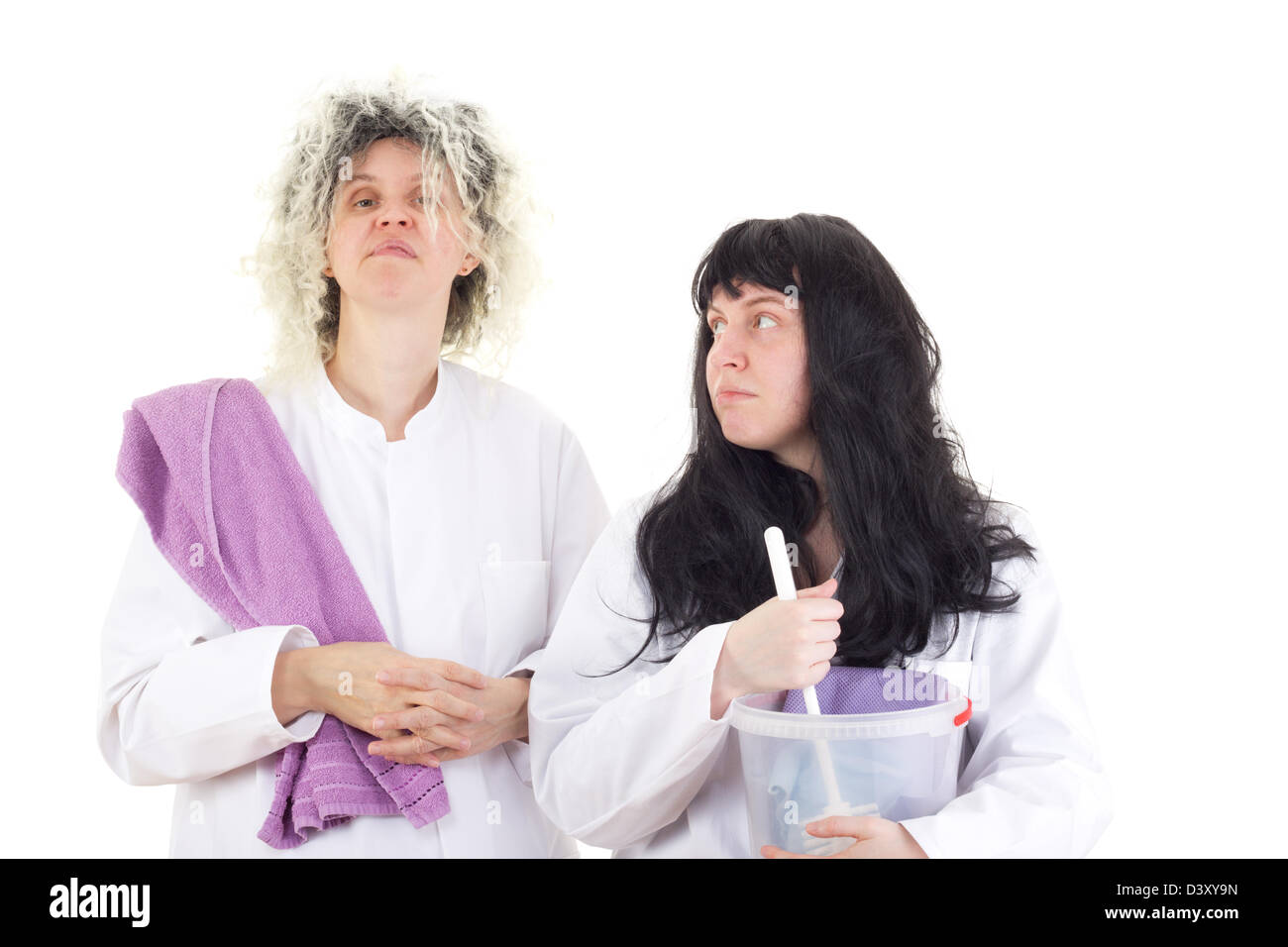Female cleaners in white work coats Stock Photo - Alamy