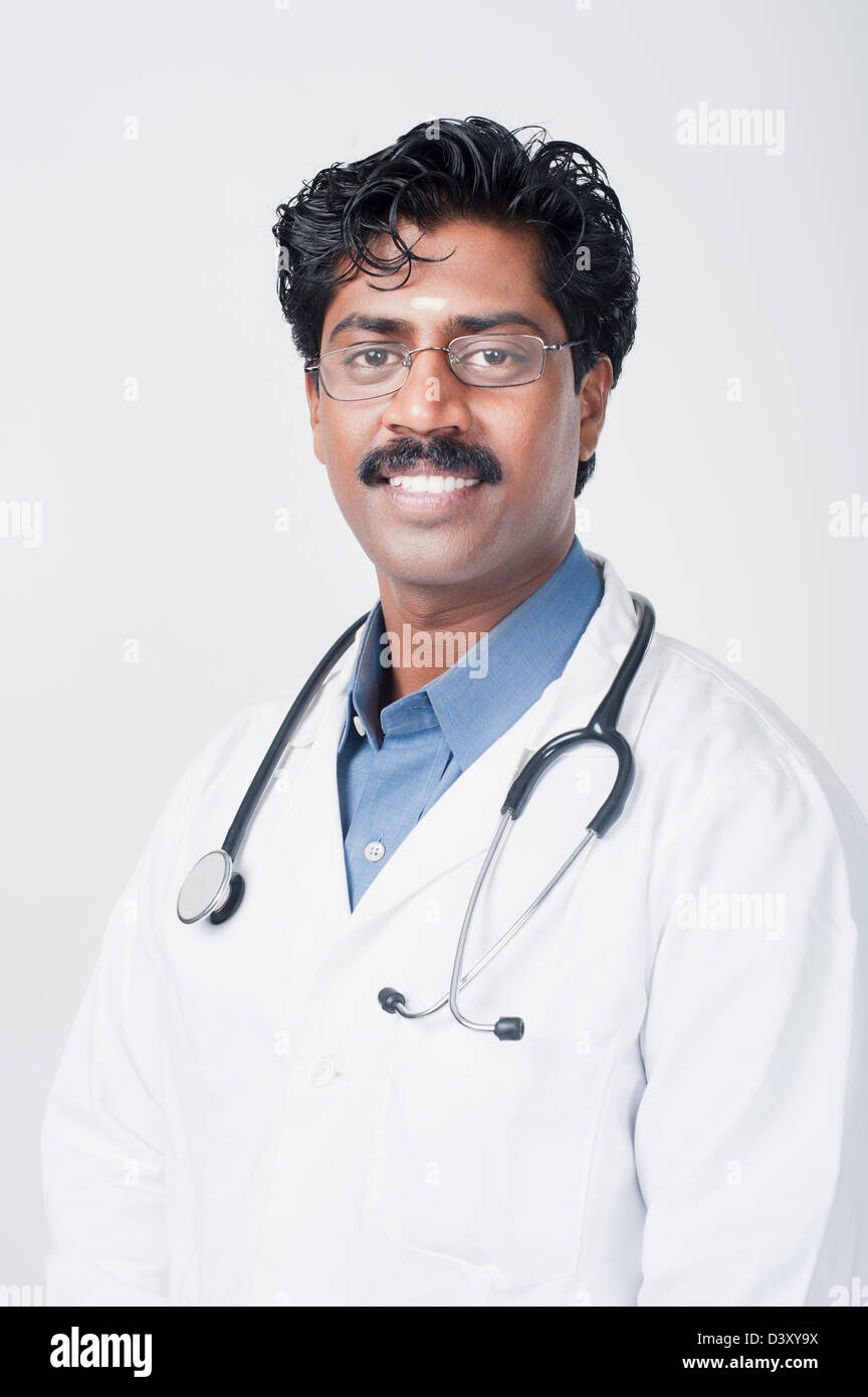 South Indian doctor smiling Stock Photo - Alamy