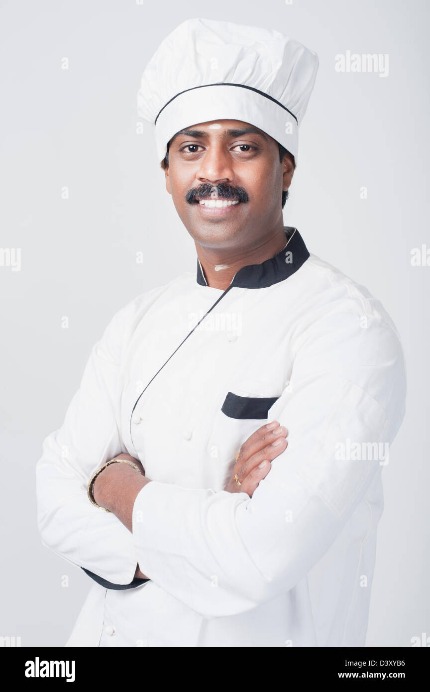 South Indian chef standing with his arms crossed and smiling Stock ...