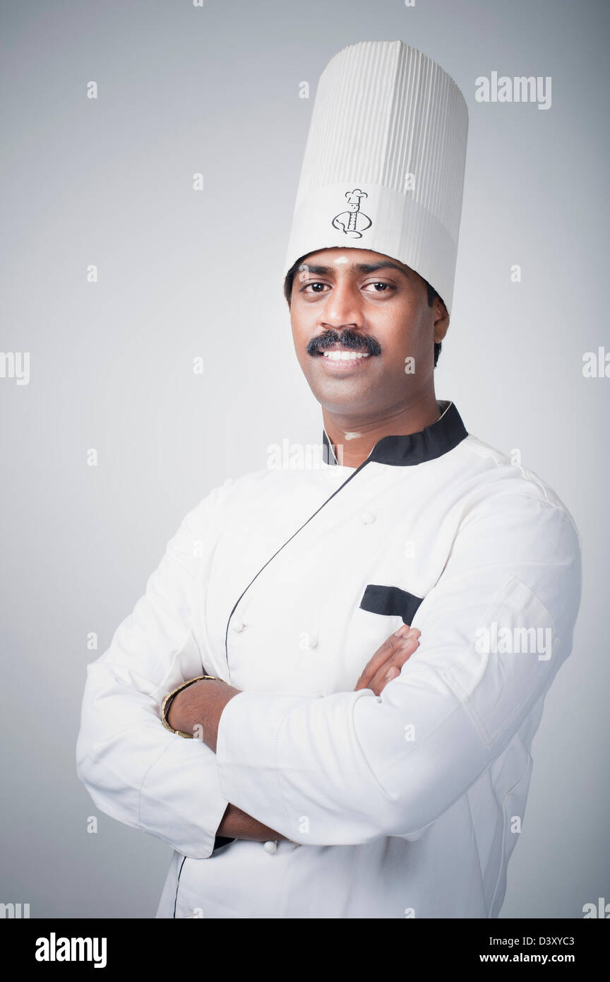 South Indian chef standing with his arms crossed and smiling Stock ...