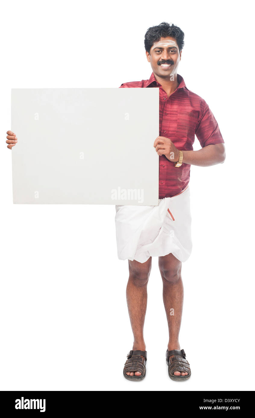 Smiling indian man standing Cut Out Stock Images & Pictures - Alamy