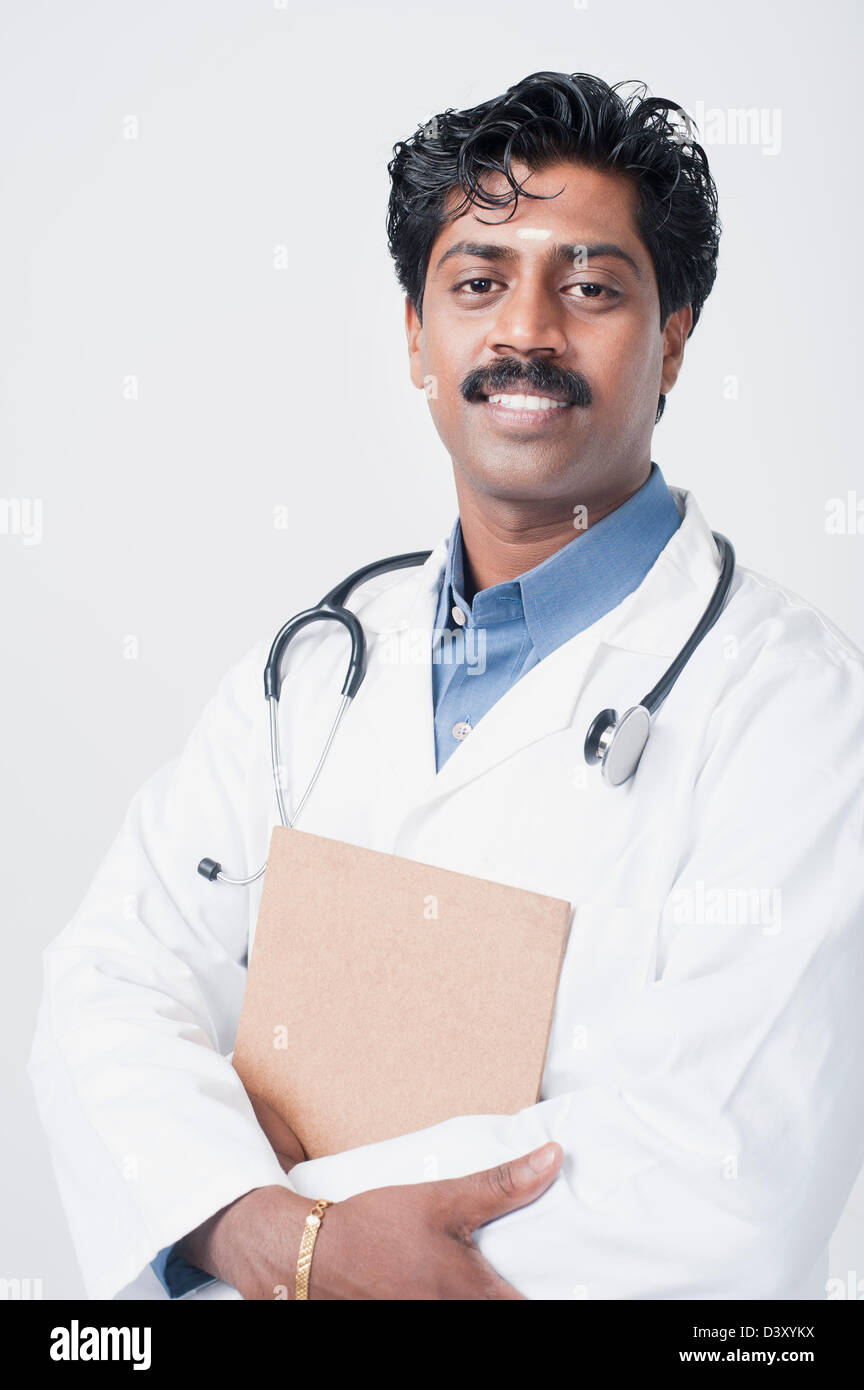 South Indian doctor smiling Stock Photo - Alamy