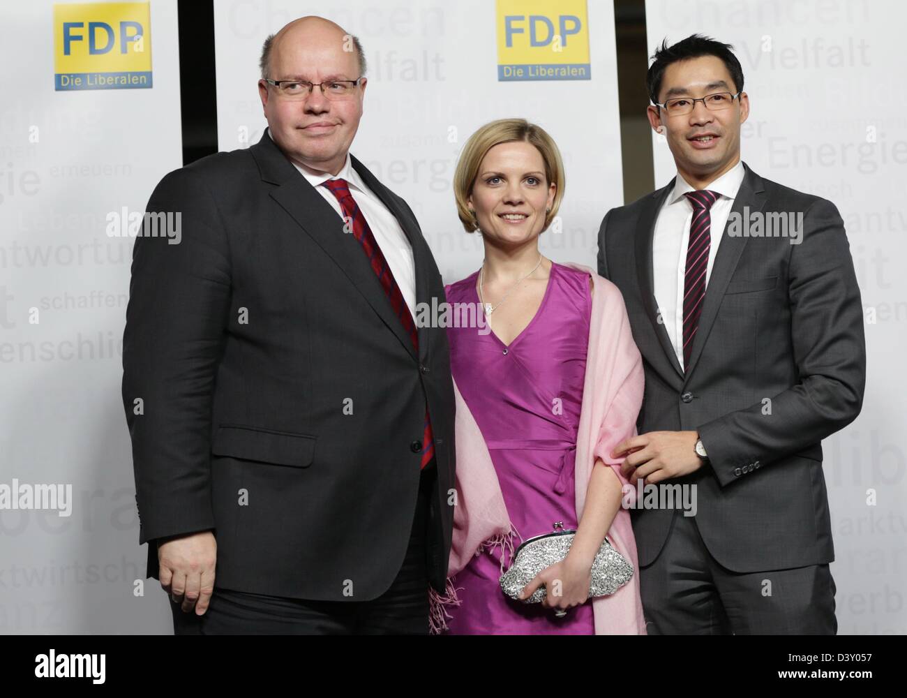 German Federal Economics Minister Philipp Roesler (R-L) and his wife ...